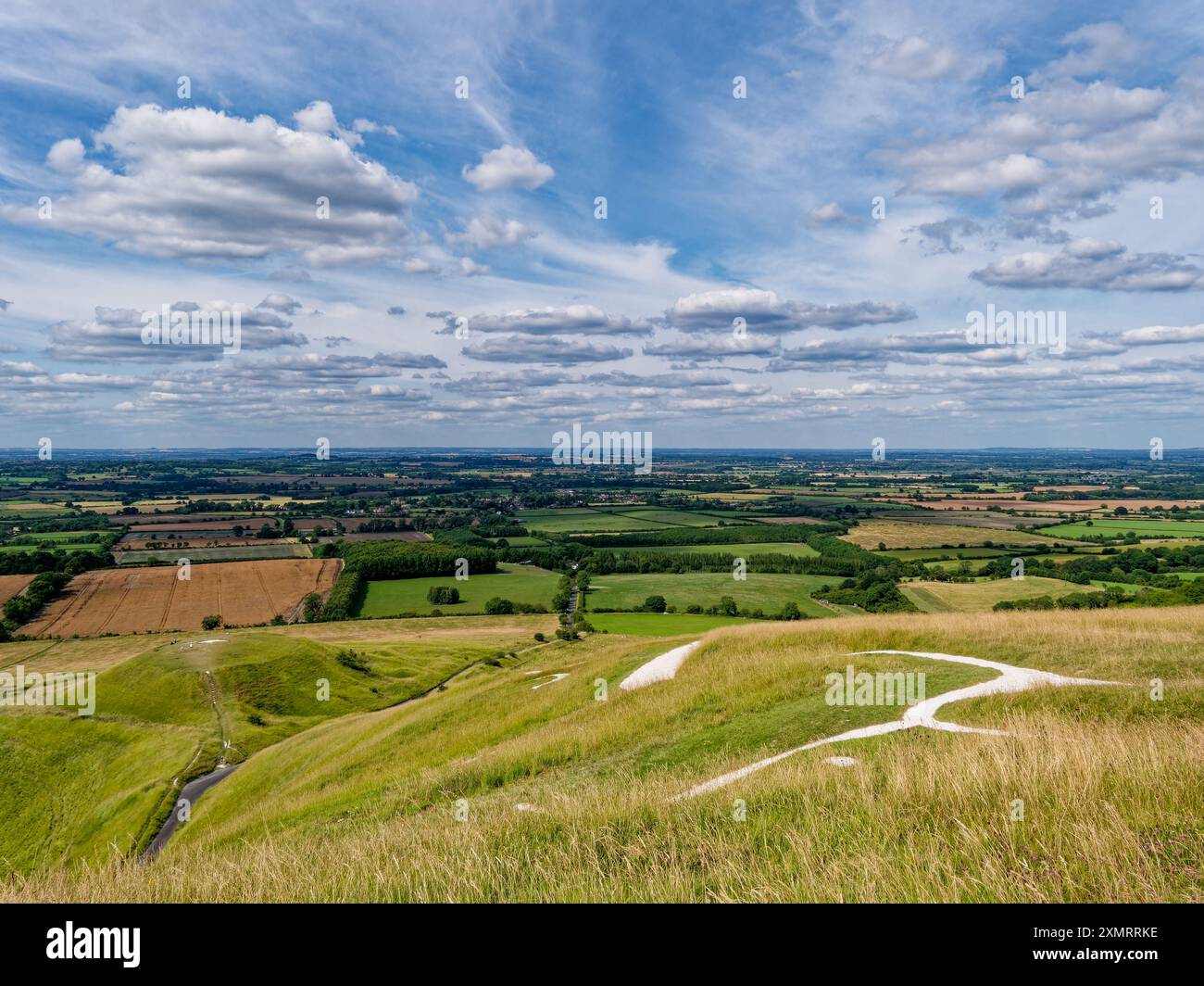 Uffington White Horse and Dragon Hill with visitors for scale in ...