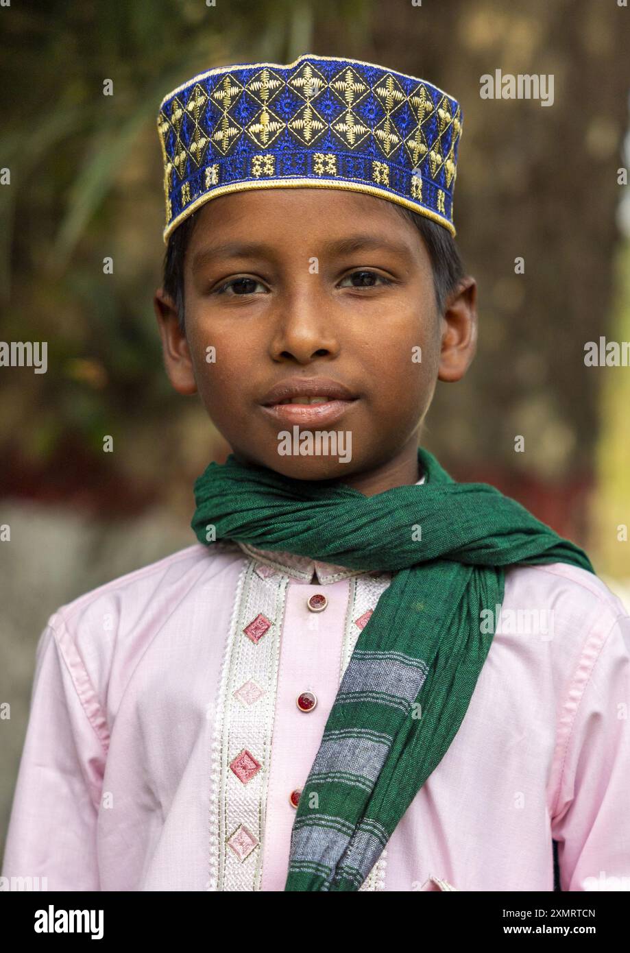 Portrait of a muslim boy in traditioanbl clothing, Chittagong Division ...