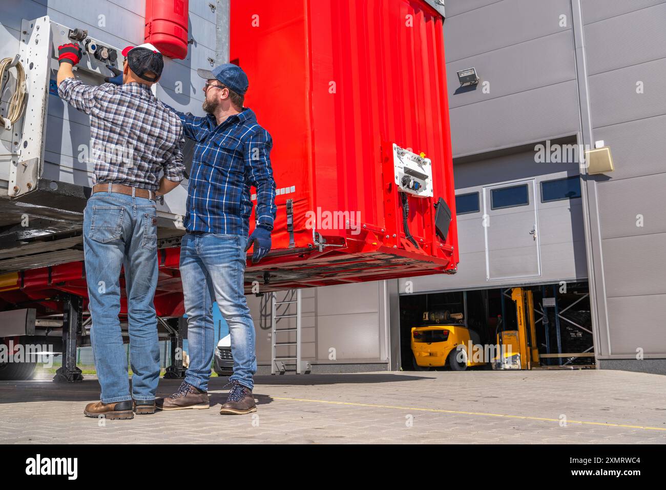 Cargo container being lifted hi-res stock photography and images - Alamy