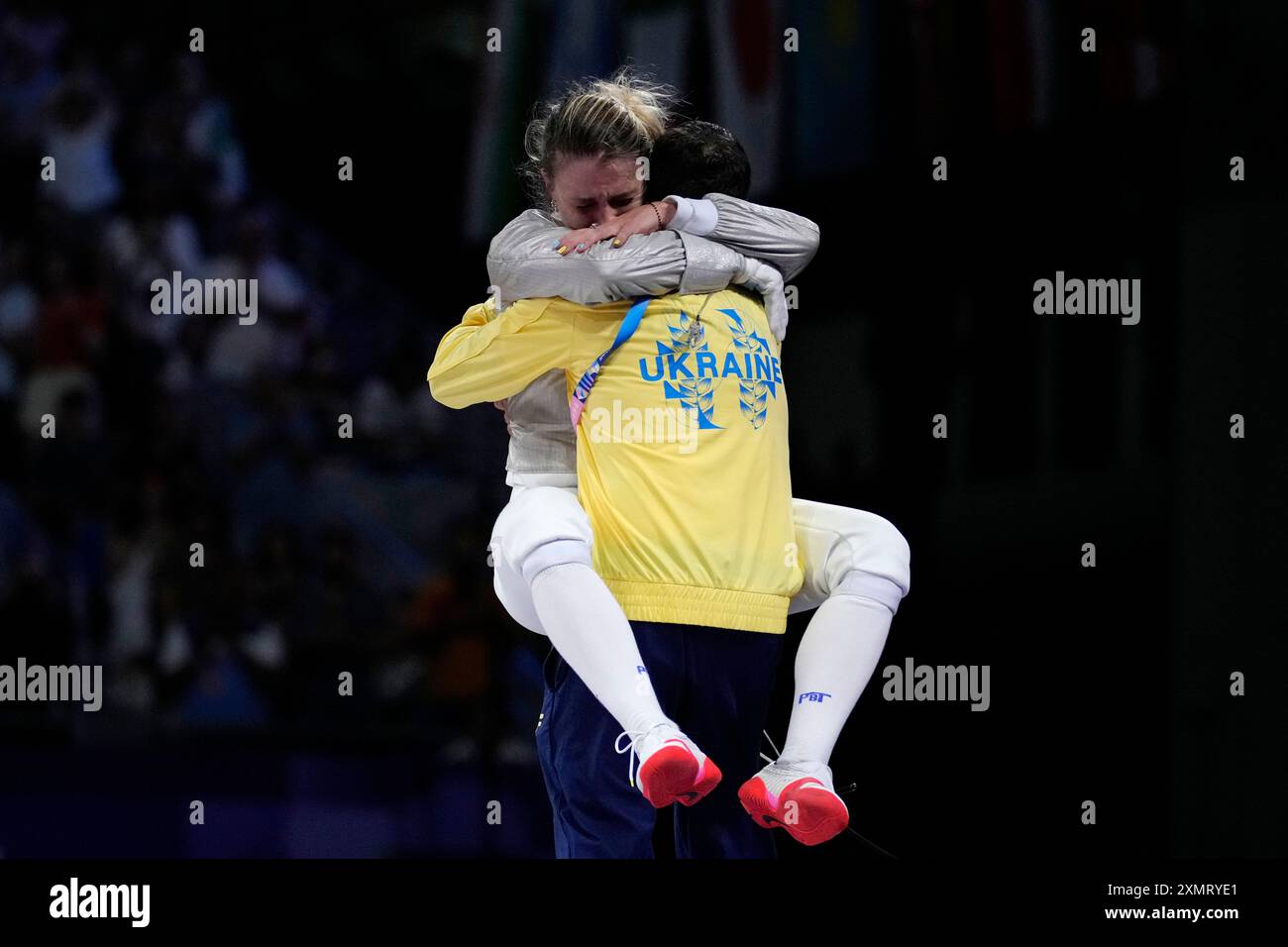 Ukraine's Olga Kharlan celebrates with her coach after winning the ...