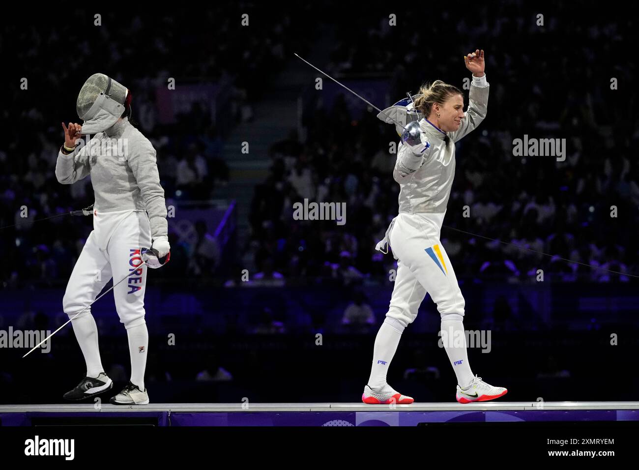 Ukraine's Olga Kharlan, right, celebrates after winning the women's ...