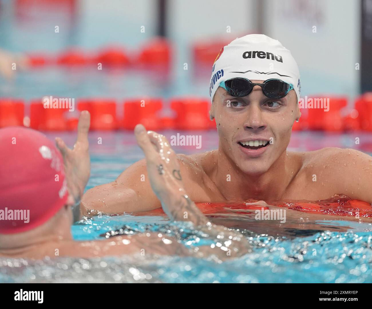 Romania's POPOVICI David celebrates after winning the swimming Men's ...