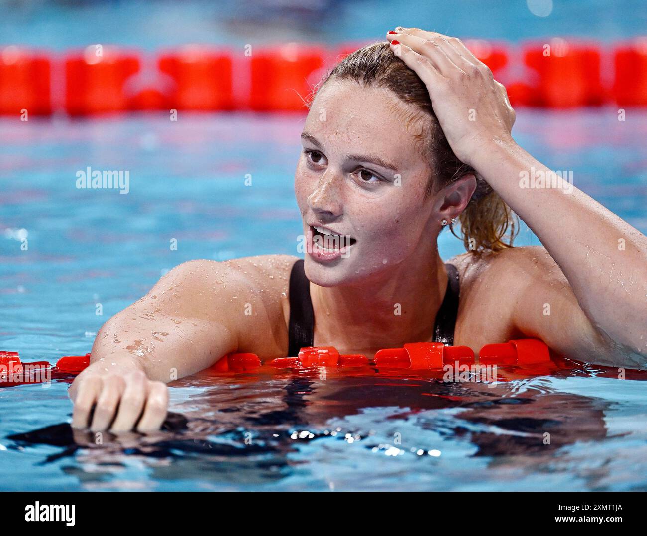Paris, France. 29th July, 2024. Summer McIntosh of Canada reacts after ...