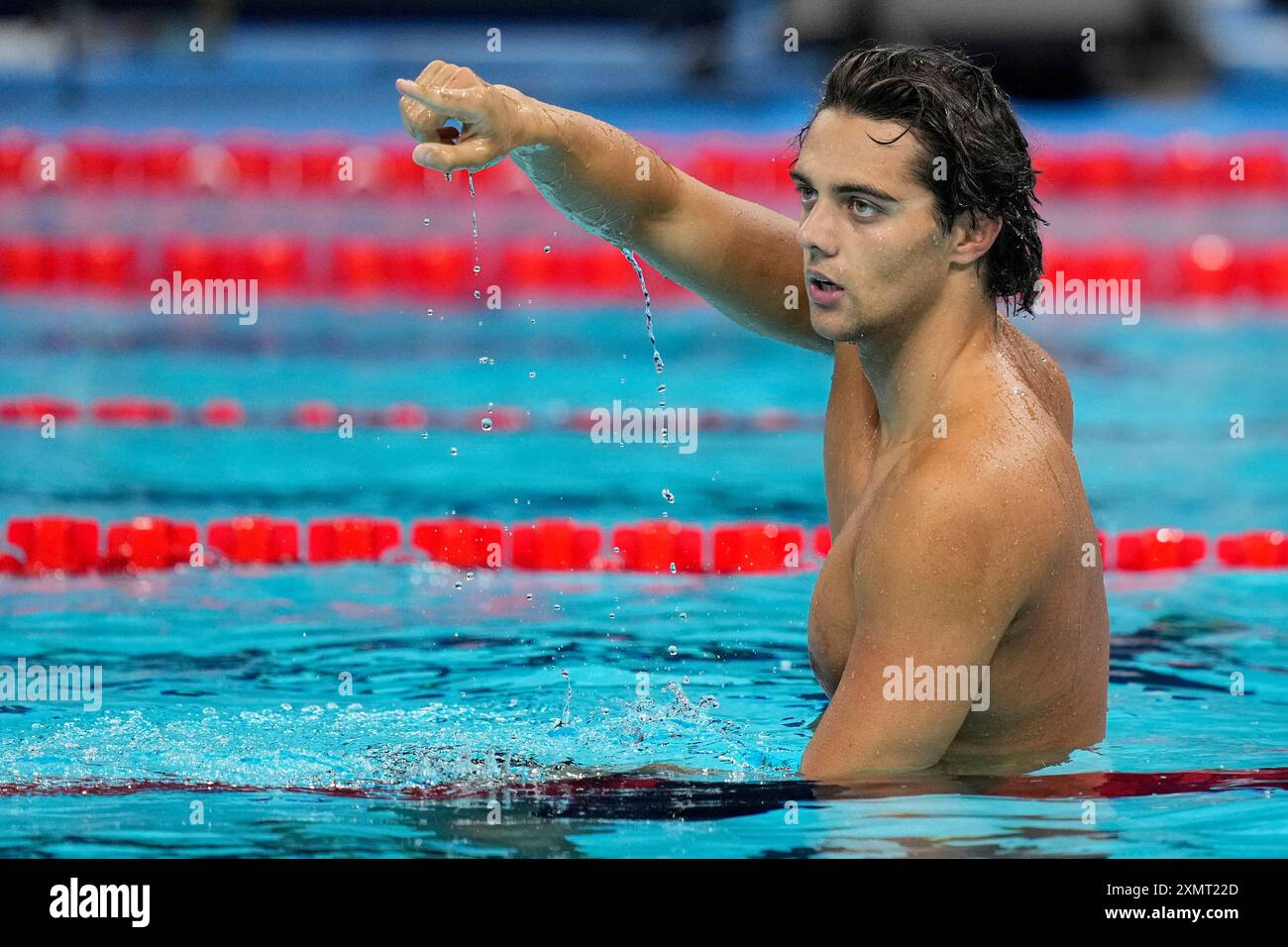 Thomas Ceccon, of Italy, reacts after winning the men's 100-meter ...