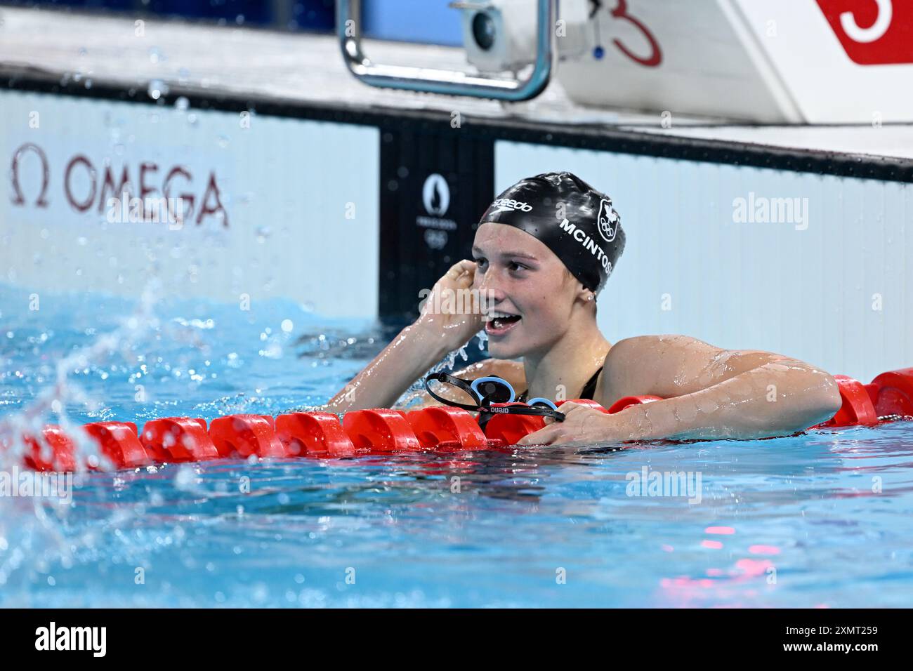 Paris, France. 29th July, 2024. Canadian swimmer Summer McIntosh reacts ...