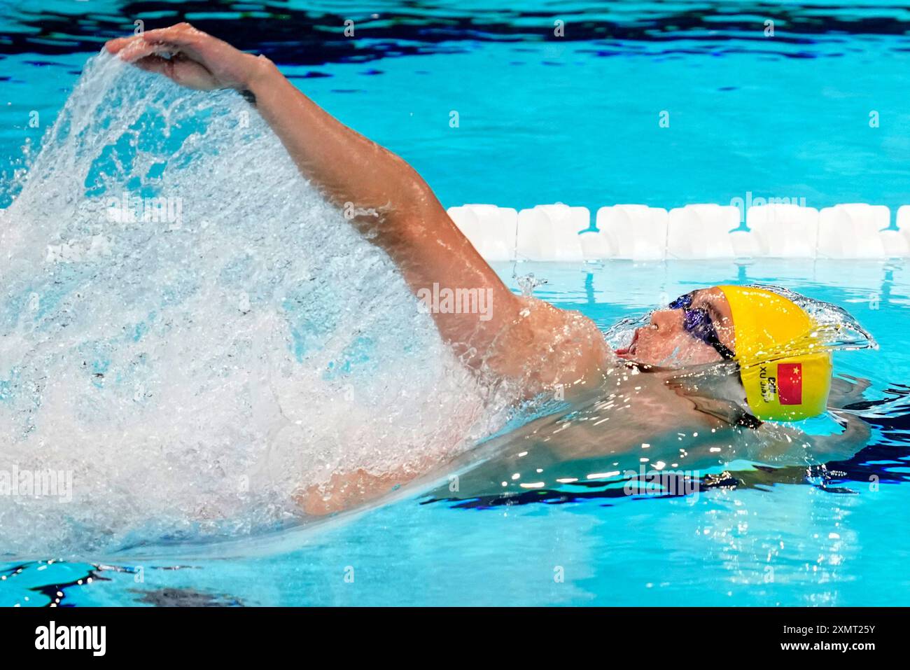 Xu Jiayu, of China, competes in the men's 100-meter backstroke final at ...