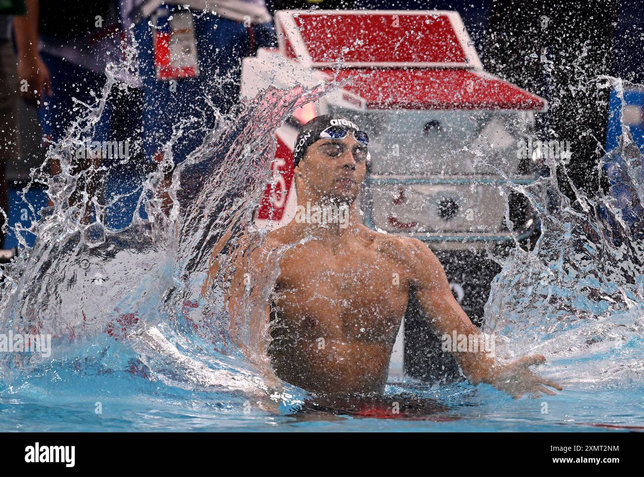 Paris, France. 29th July, 2024. Italian swimmer Thomas Ceccon reacts ...