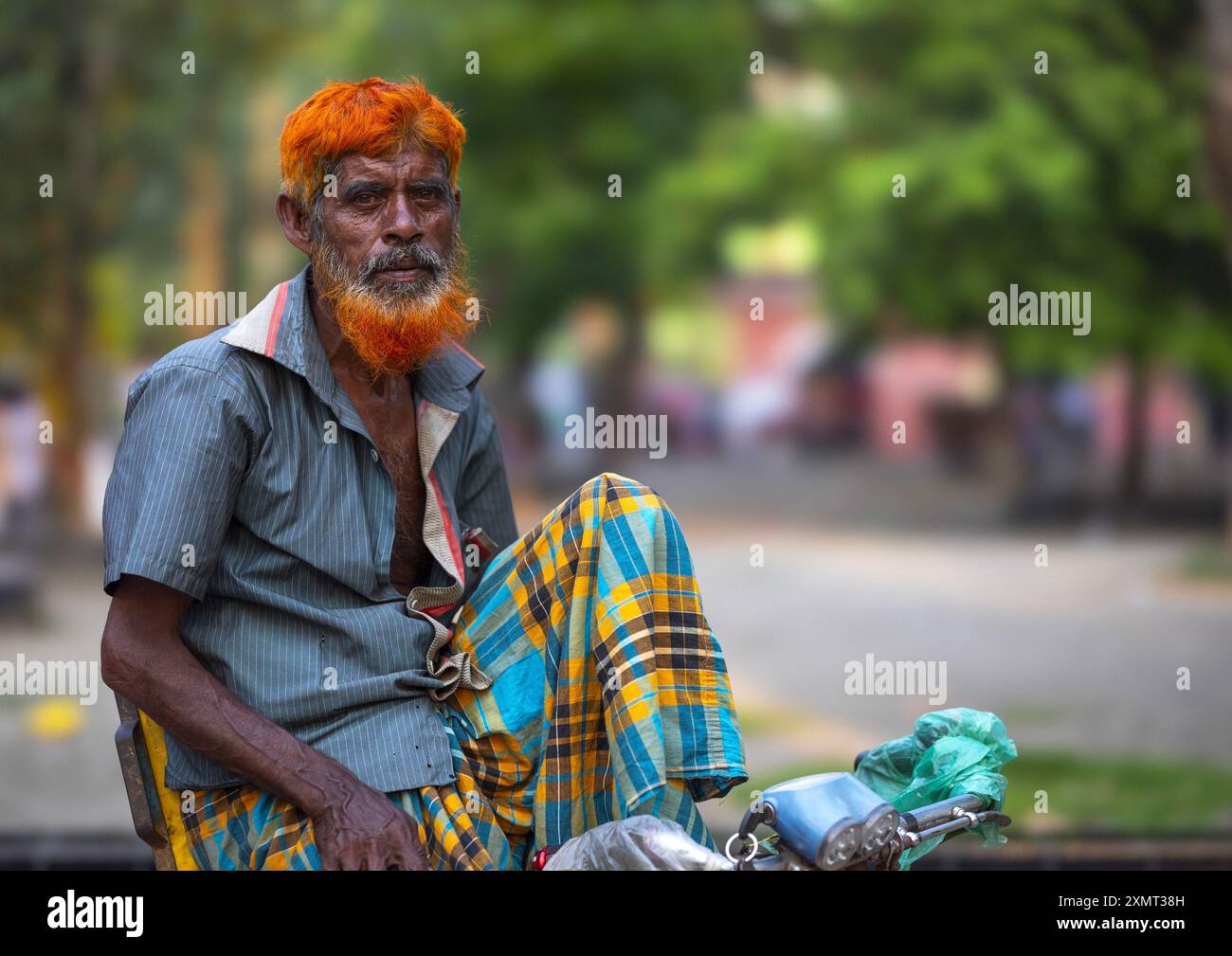 Portrait of a bangladeshi man with a beard dyed in henna, Khulna ...
