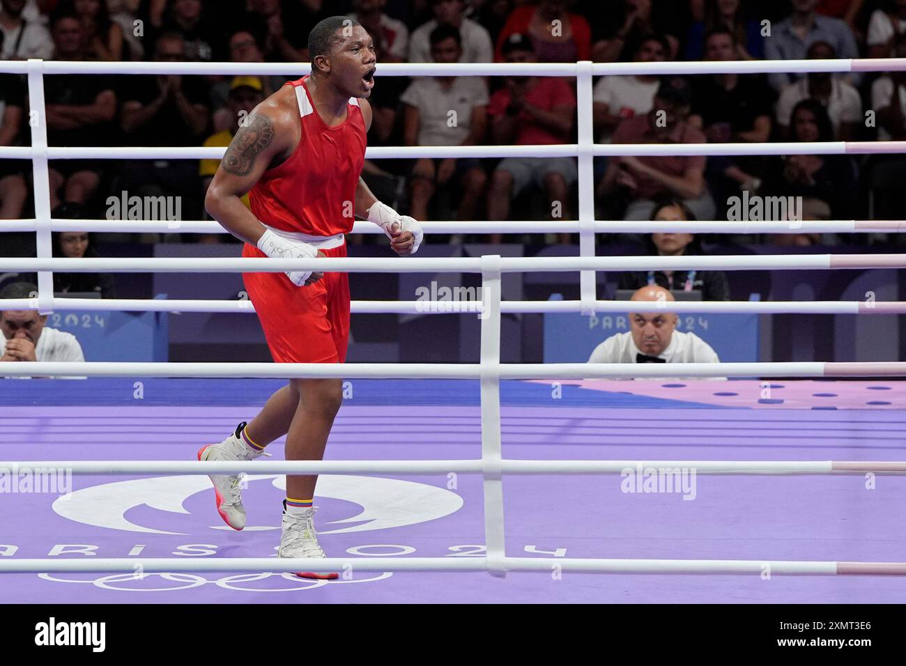 Ecuador's Gerlon Congo celebrates after defeating Brazil's Abner ...