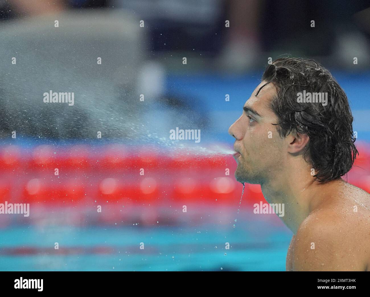 Italy's CECCON Thomas reacts after winning the swimming Men's 100m ...
