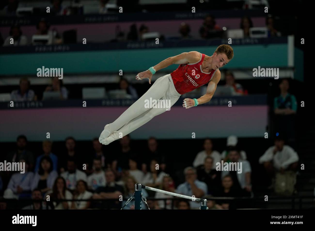 Matteo Giubellini, of Switzerland, performs on the horizontal bar ...