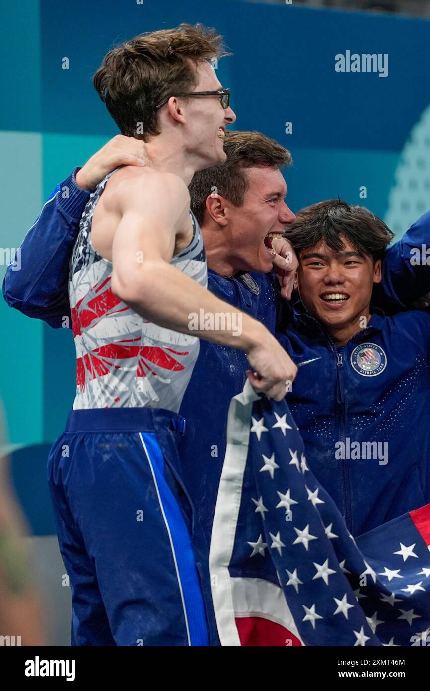 Stephen Nedoroscik, of United States, with Brody Malone and Asher Hong ...