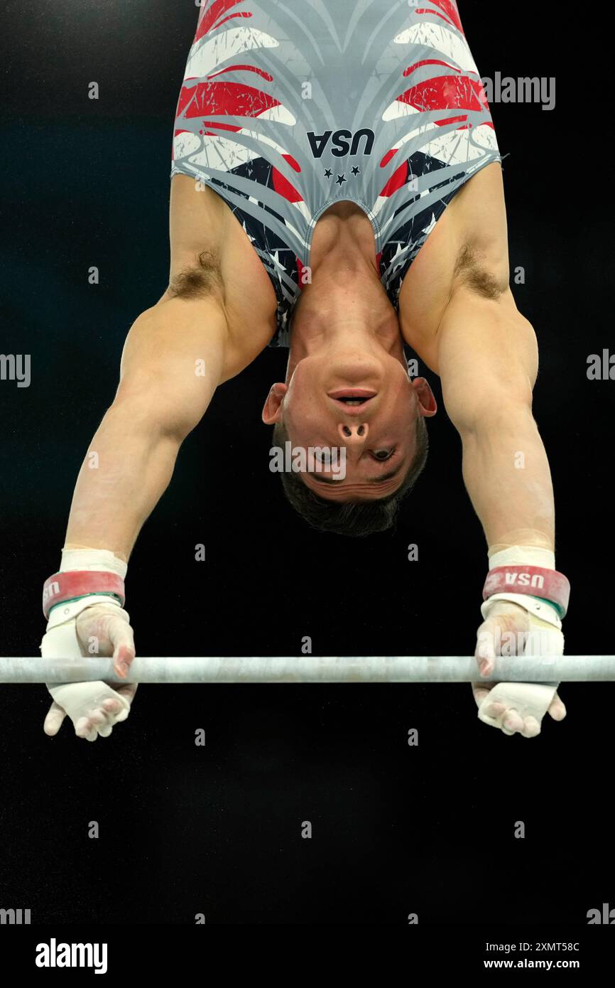 Paul Juda, of the United States, performs on the horizontal bar during ...