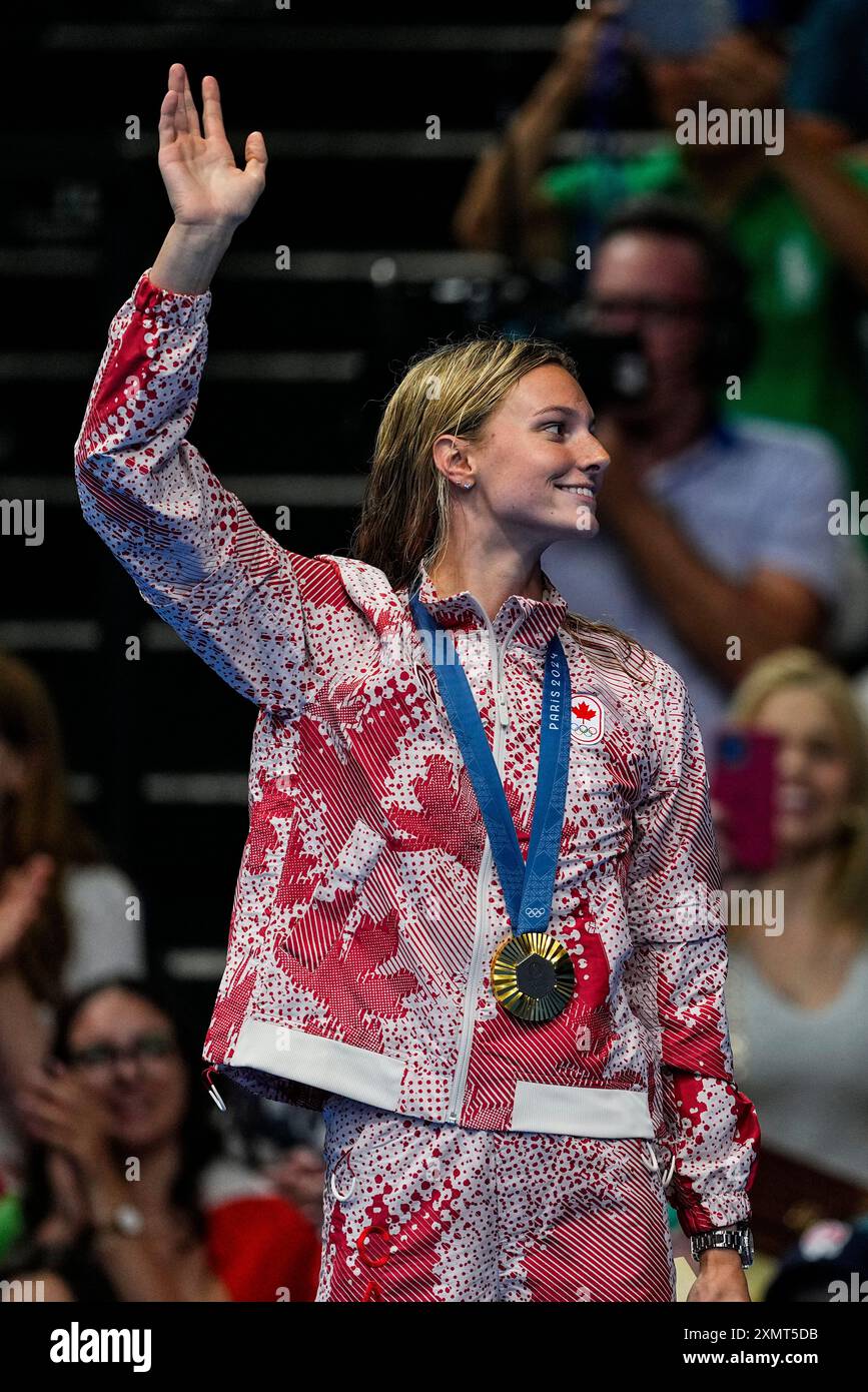 Summer McIntosh of Canada is seen with her gold medal after winning the ...