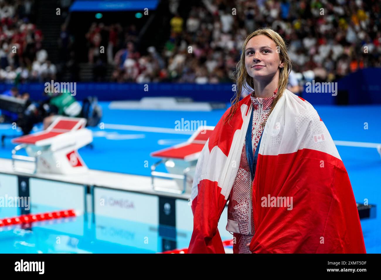 Summer McIntosh of Canada is seen with her gold medal after winning the ...