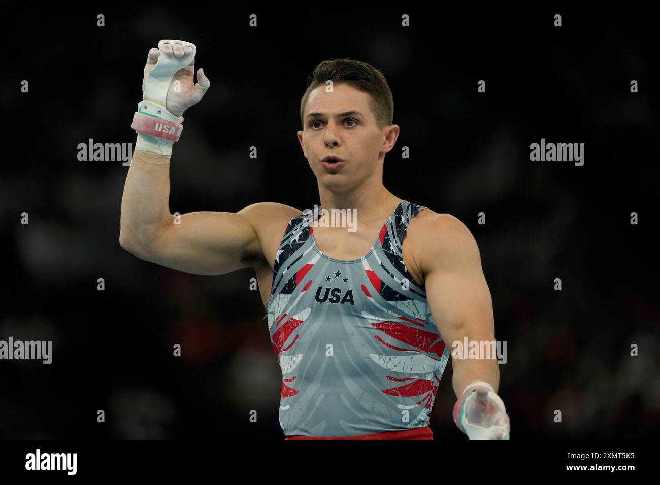 Paul Juda, of the United States, performs on the horizontal bar during ...