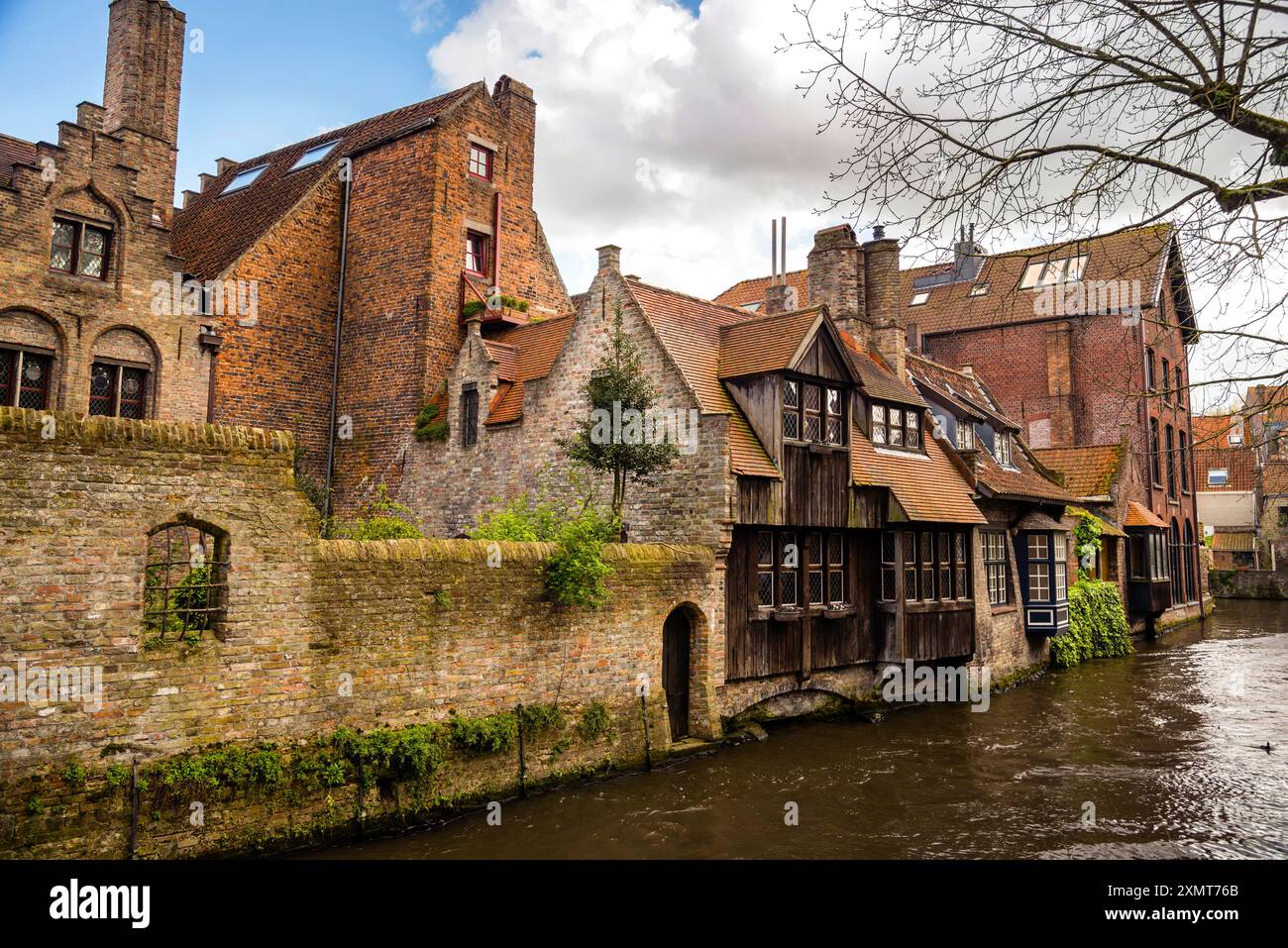 Gothic style brick stepped gable and medieval wood houses in Bruges ...