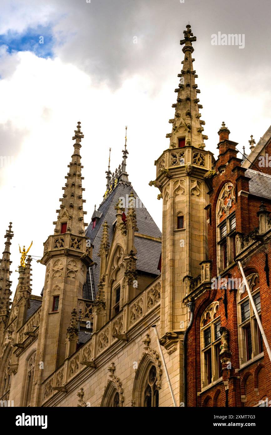 Side view of gothic Revival City Hall and Gothic style brick stepped ...