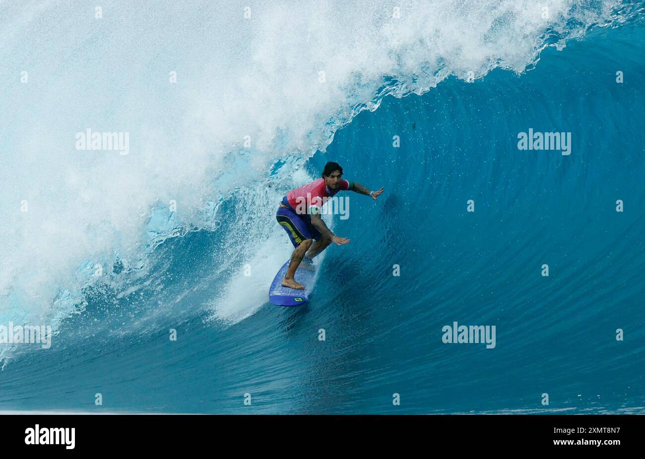 Brazil's Gabriel Medina drops into a large barrel in the fifth heat of ...