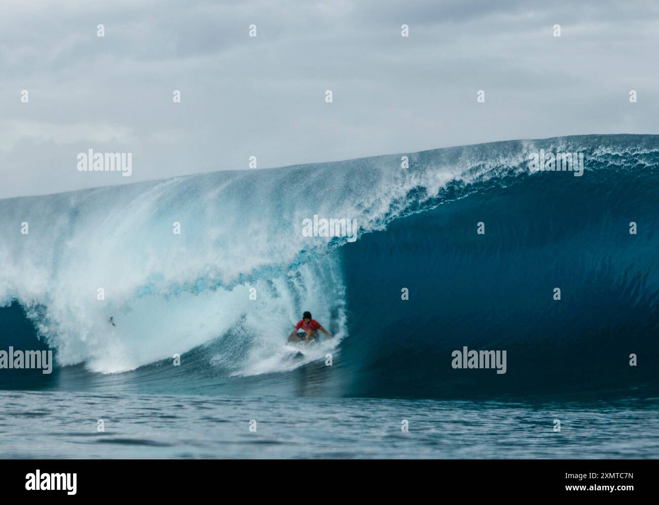 Brazil's Joao Chianca gets a barrel in the sixth heat of the men's ...