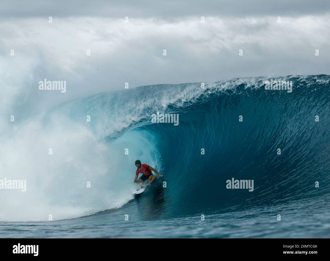 Brazil's Joao Chianca gets a barrel in the sixth heat of the men's ...