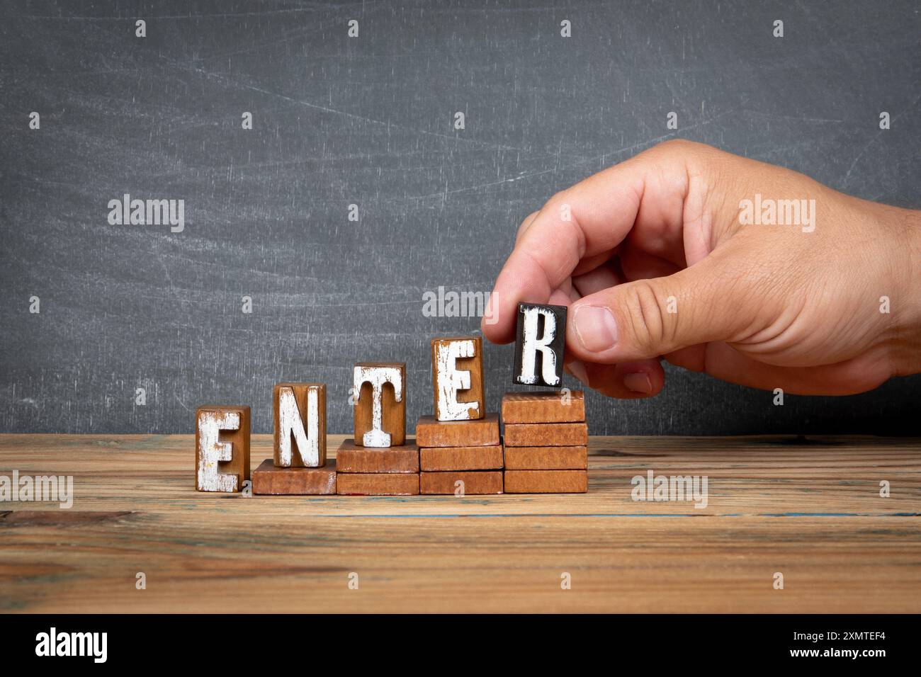 ENTER. Wooden letters, alphabet blocks on steps. development and growth ...