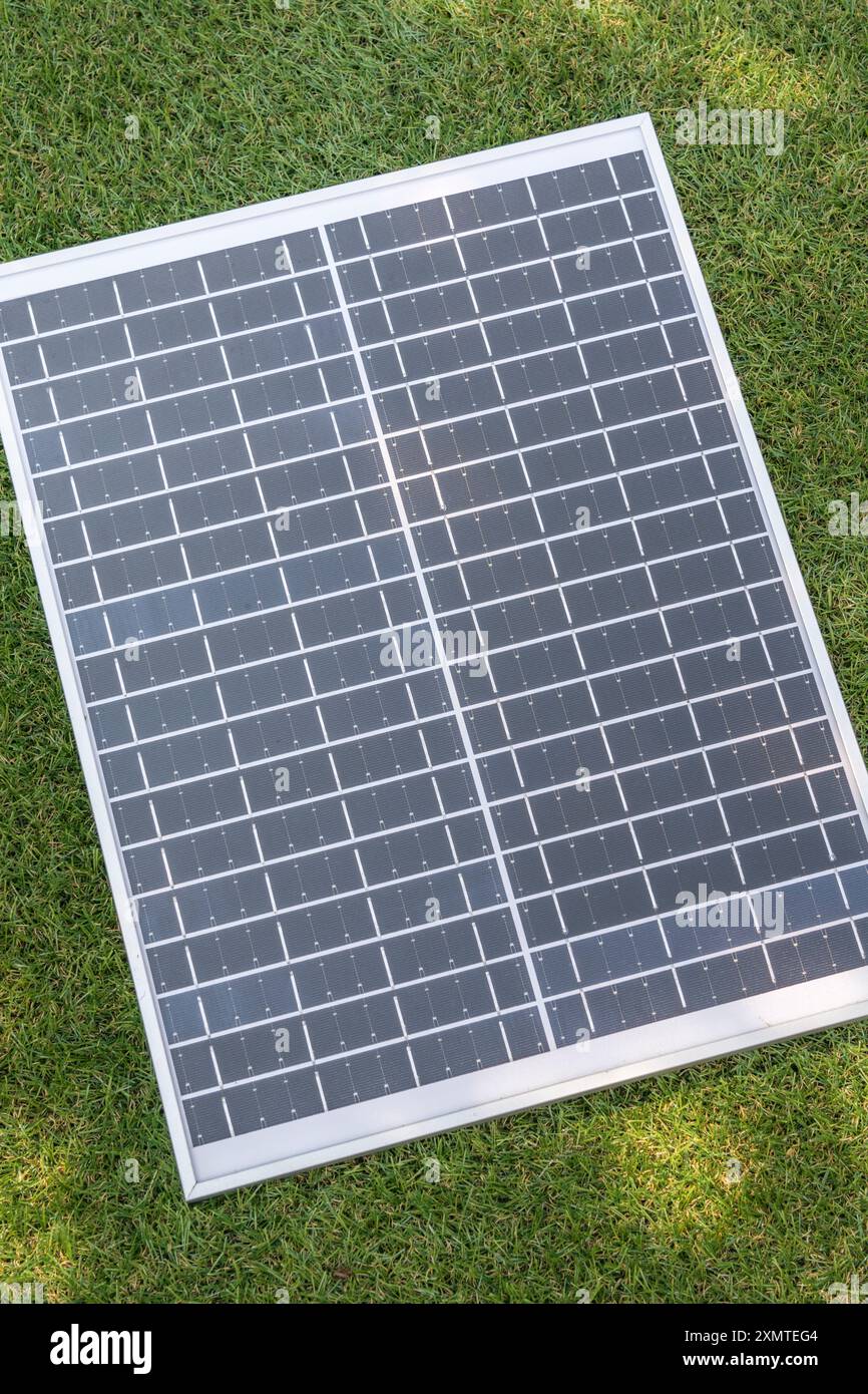 12v 25w monocrystalline solar panel from Eco-Worthy on faux grass ...