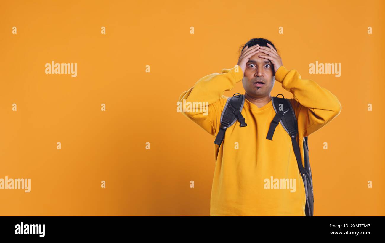 Overloaded delivery man carrying huge stack of pizza boxes, worried ...
