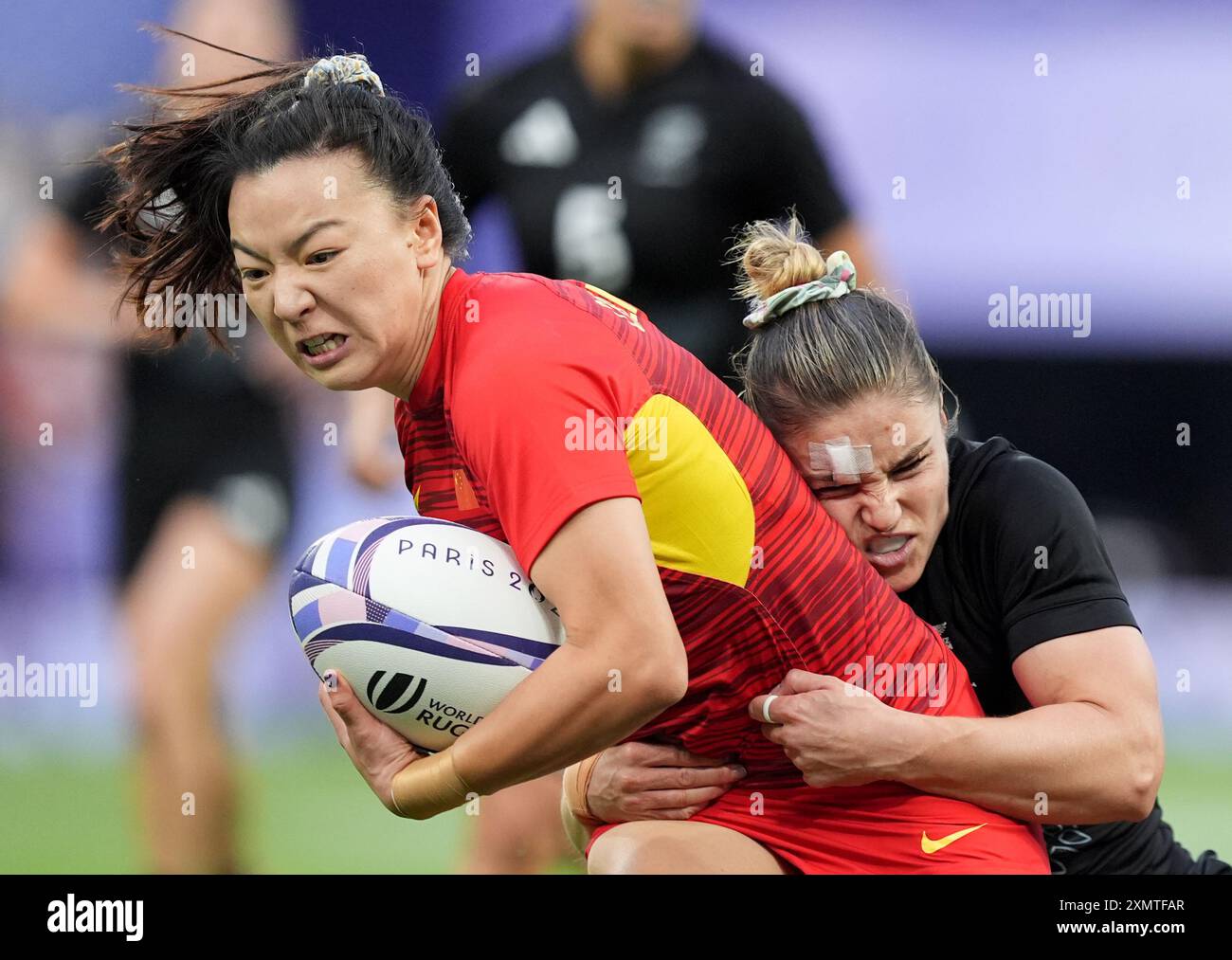 Paris, France. 29th July, 2024. Chen Keyi (L) of China competes against ...