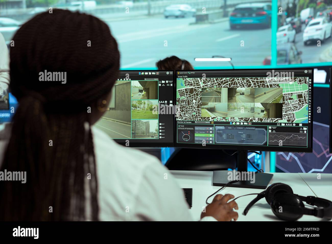 Agency employee following city traffic on her computer by using CTV ...
