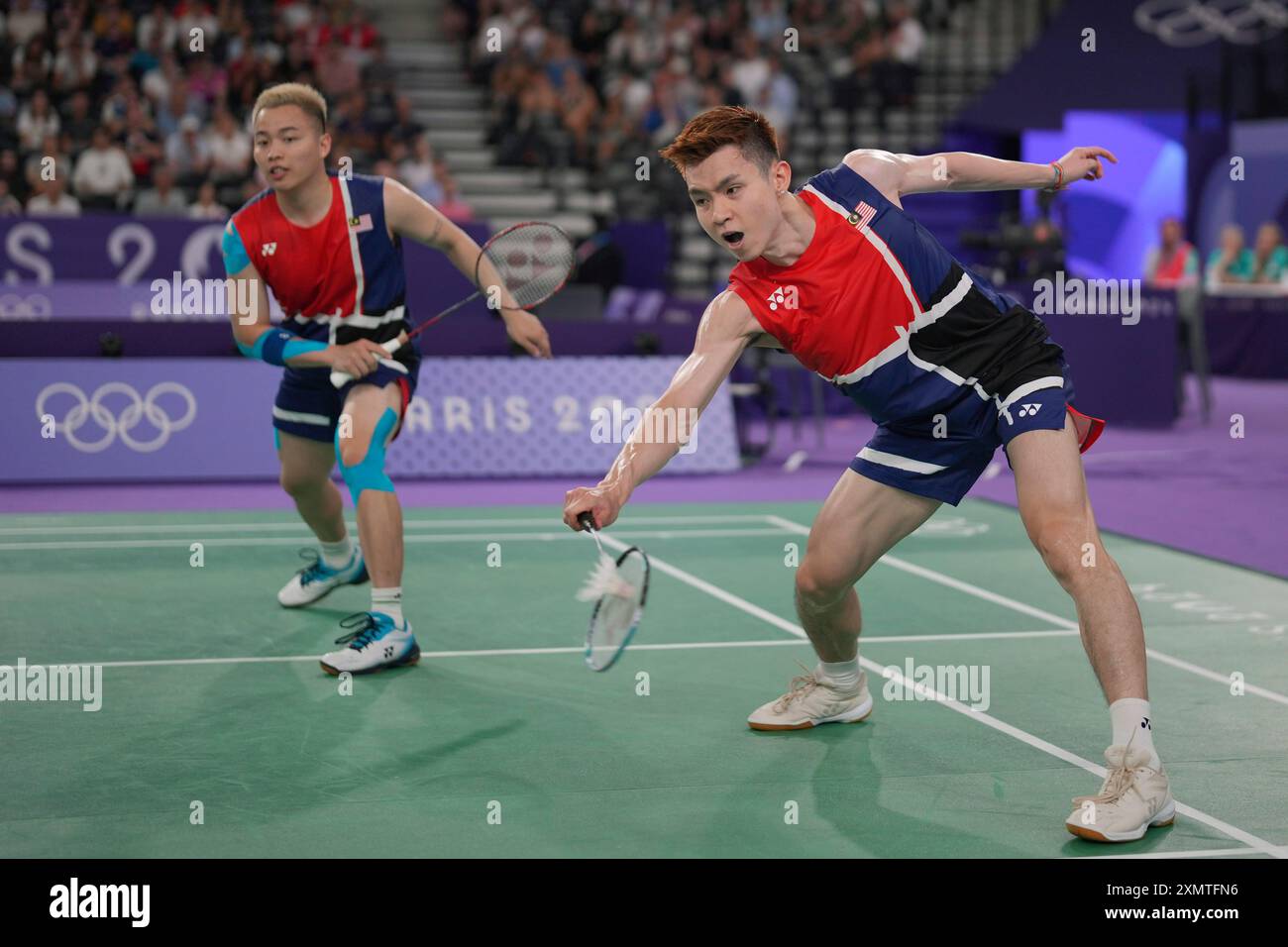 Malaysia's Aaron Chia, left, and Soh Wooi Yik play against China's ...