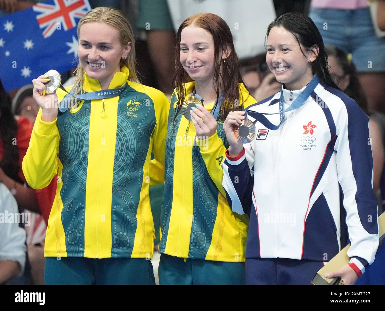 Paris, France. 29th July, 2024. Gold medalist Mollie O'Callaghan of Australia (C), silver ...
