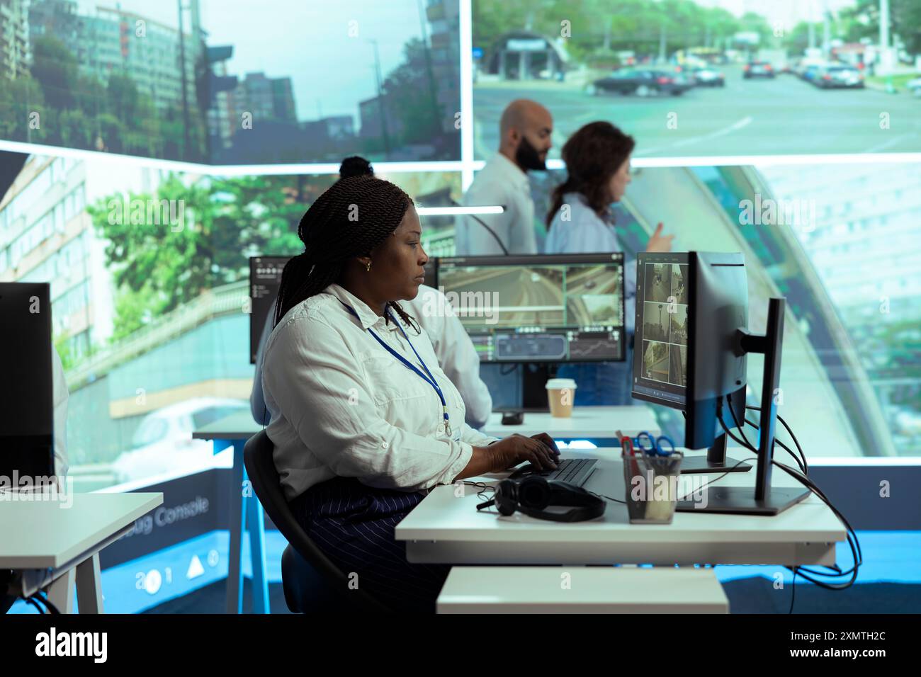 African american government employee monitoring traffic to ensure ...