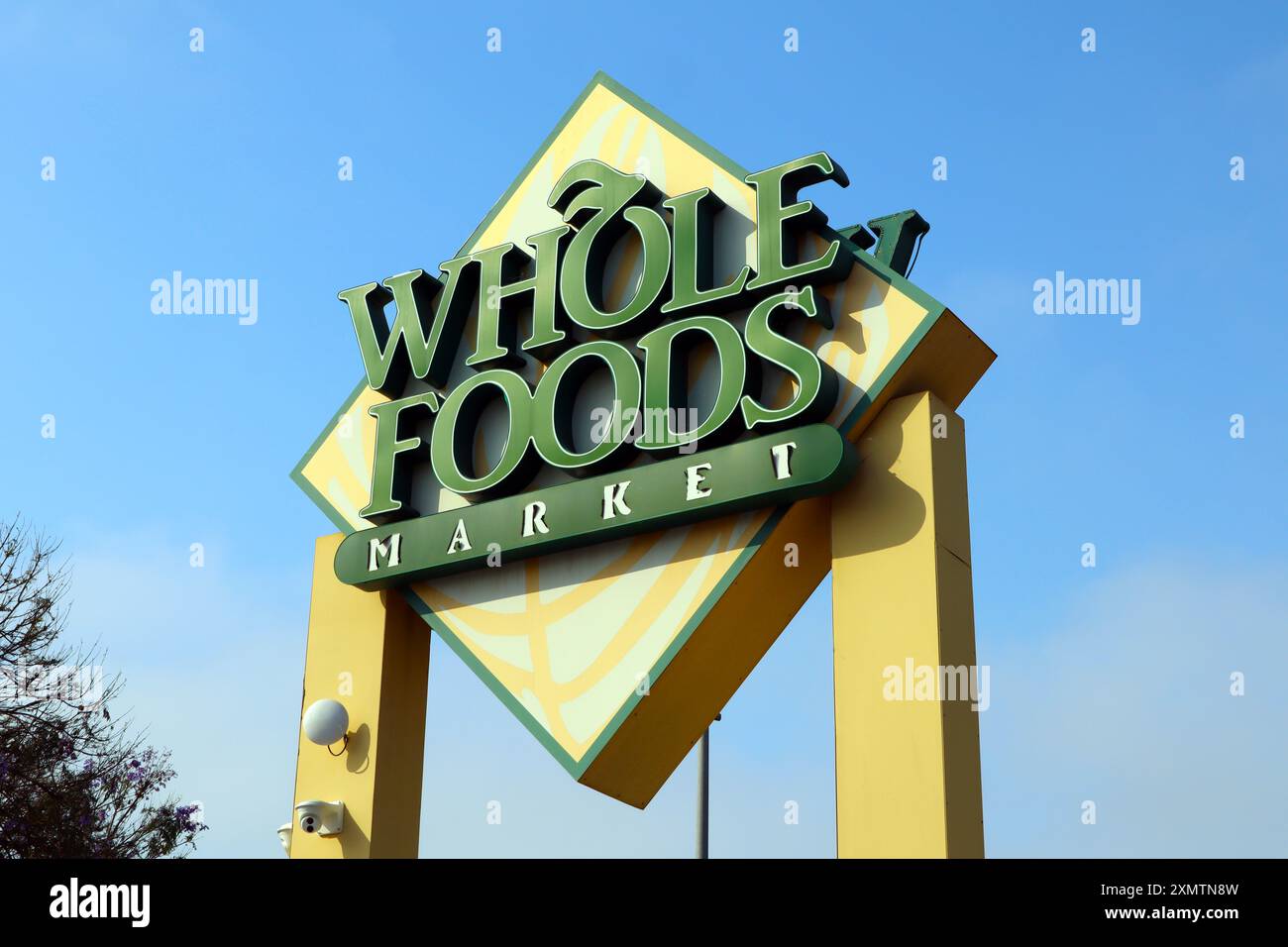 Whole Foods Market sign, a subsidiary of Amazon, American multinational ...