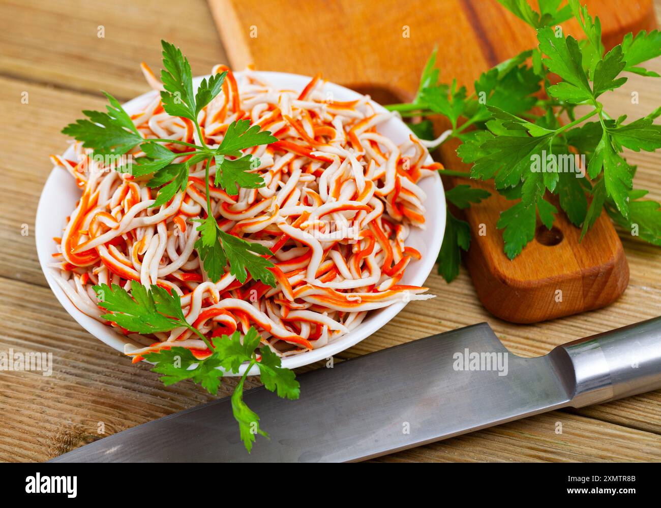 Grated fresh surimi Stock Photo - Alamy
