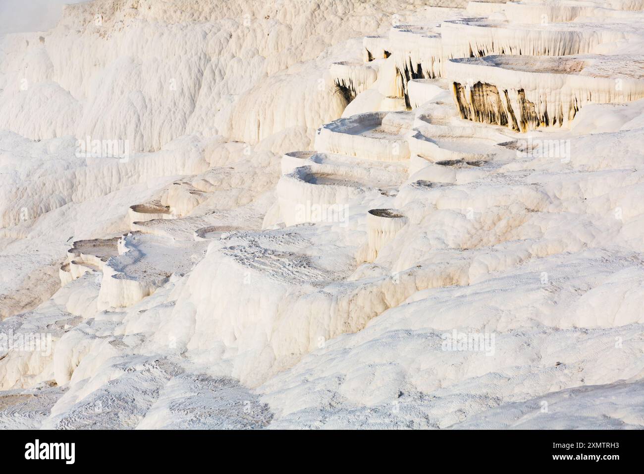 White terraced baths of Pamukkale thermal springs, Turkey Stock Photo ...