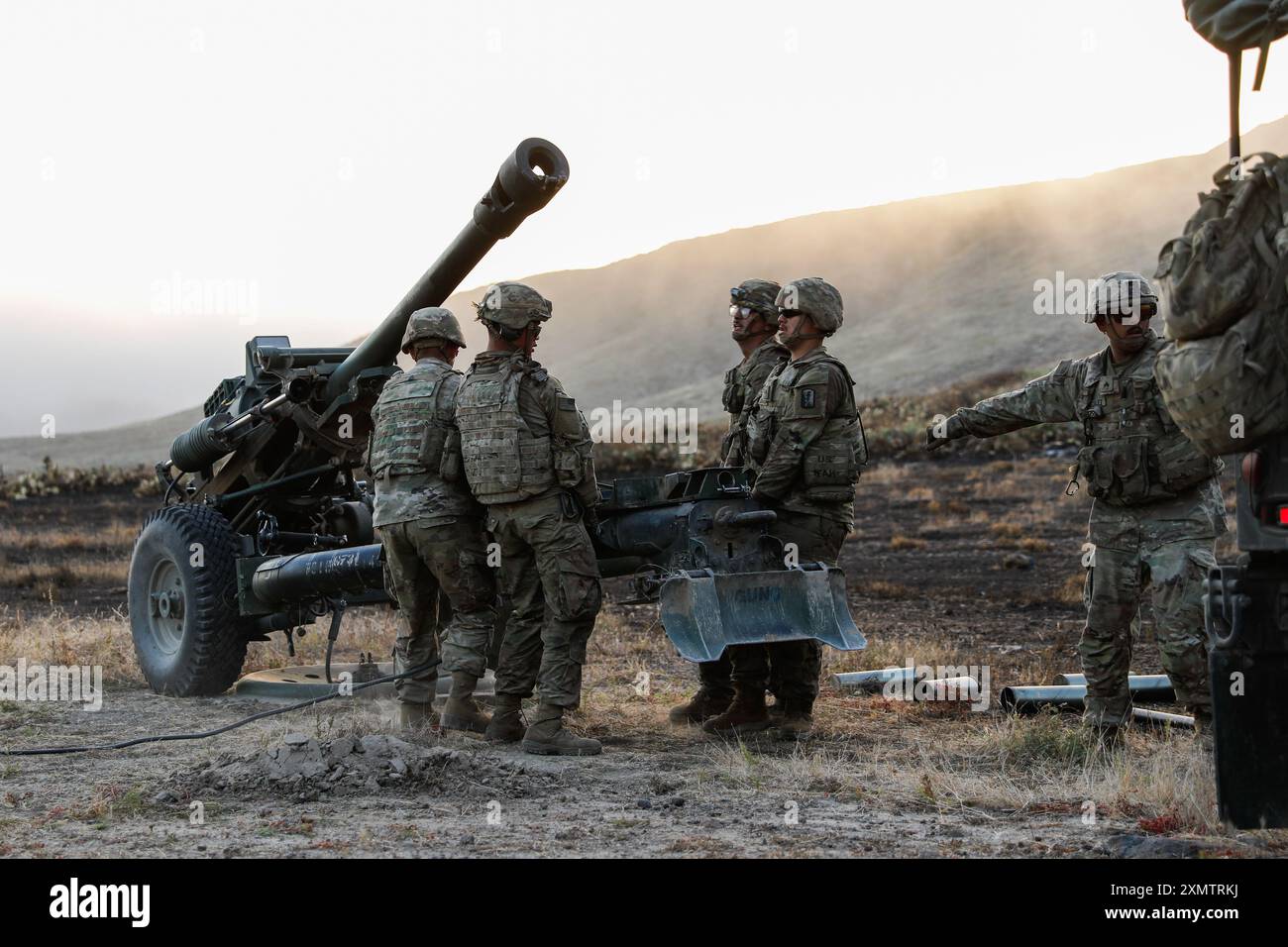 Soldiers of the 1st Battalion, 143rd Field Artillery Regiment, 79th ...
