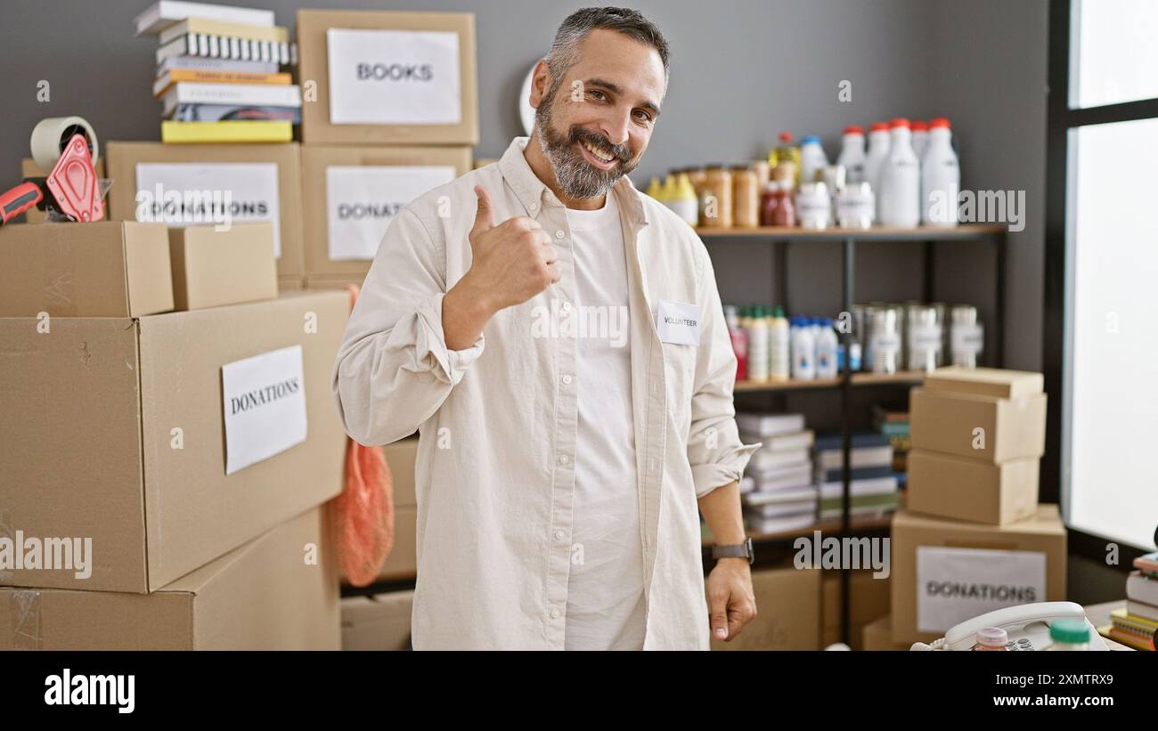 Man giving donation boxes hi-res stock photography and images - Alamy
