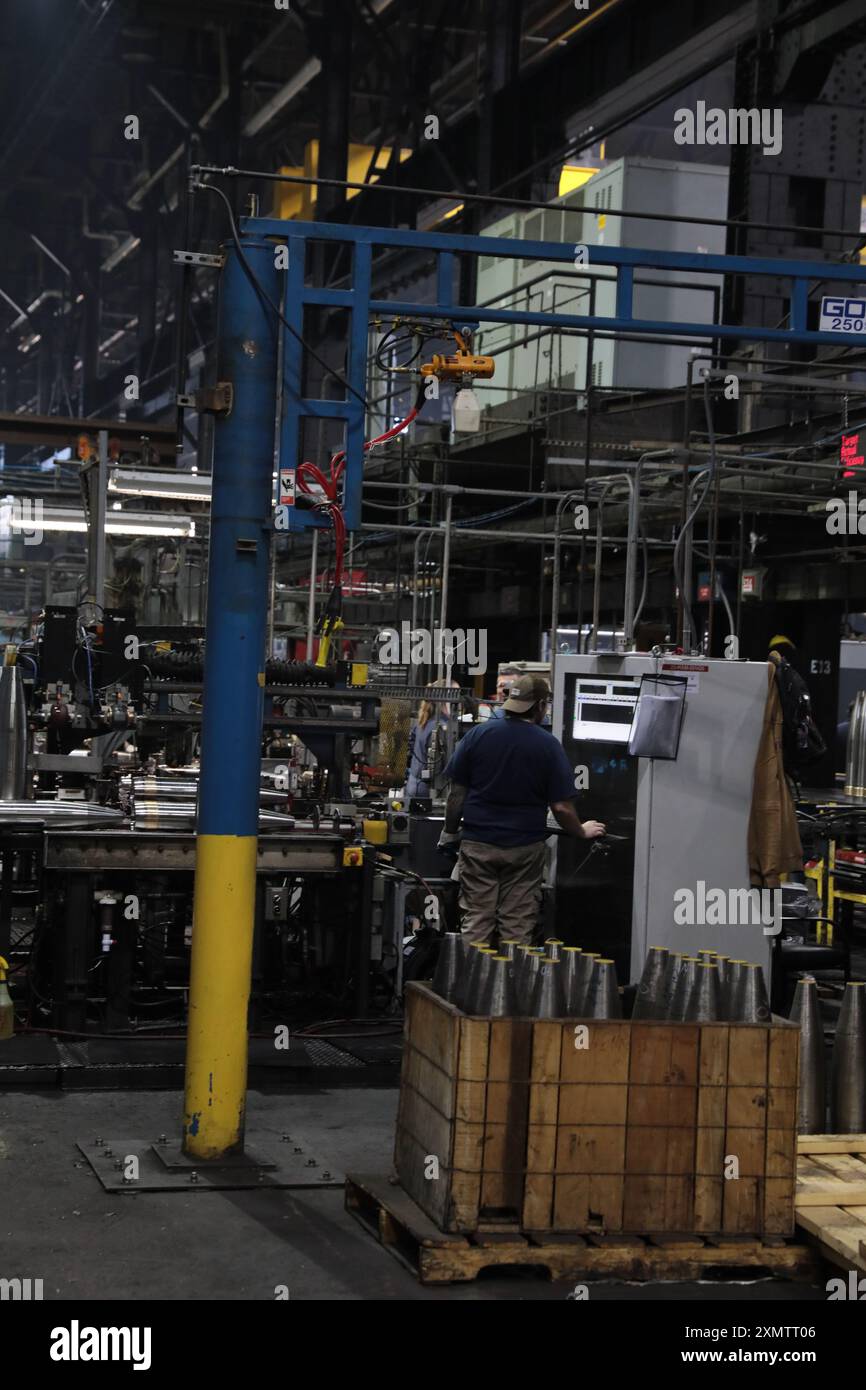 Scranton Army Ammunition Plant Employee checks Projectile Case for ...