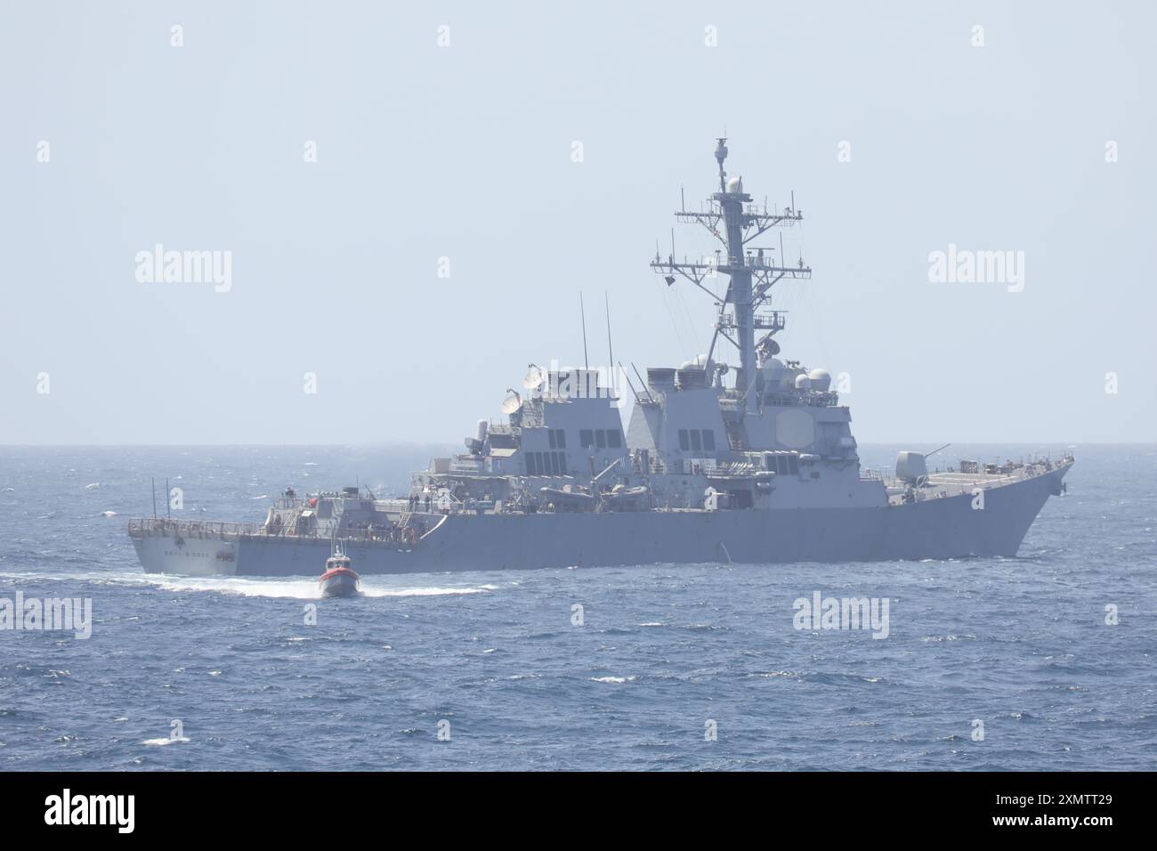 Coast Guard Cutter Stone (WMSL 758) conducts small boat operations with ...