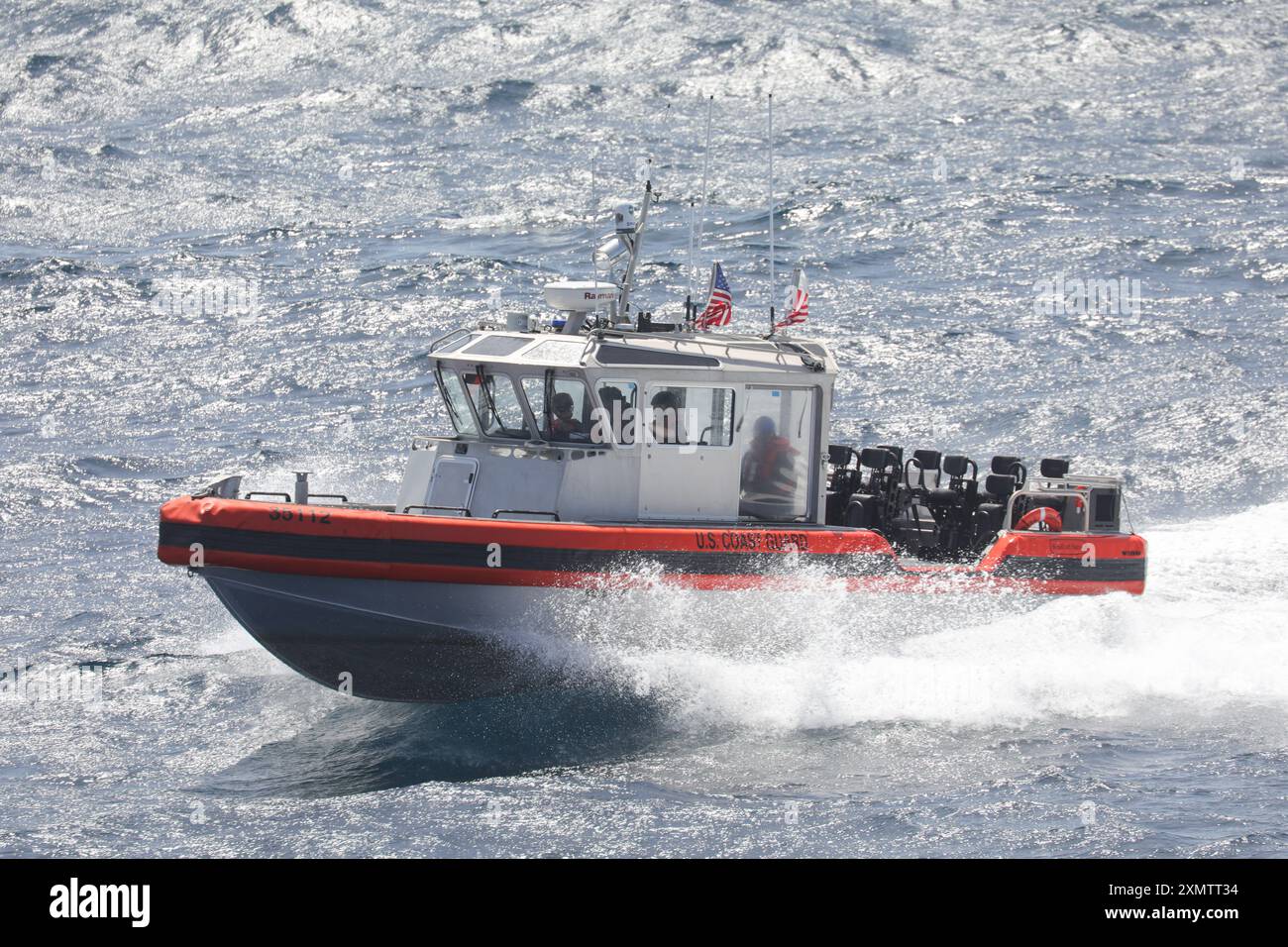 Coast Guard Cutter Stone (WMSL 758) conducts small boat operations with ...