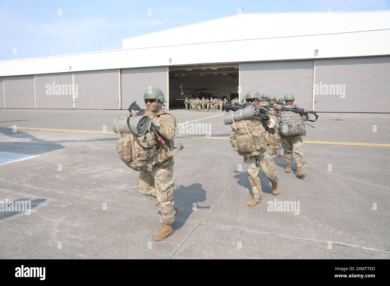 U.S. Army National Guard officer candidates load a CH-47 helicopter ...