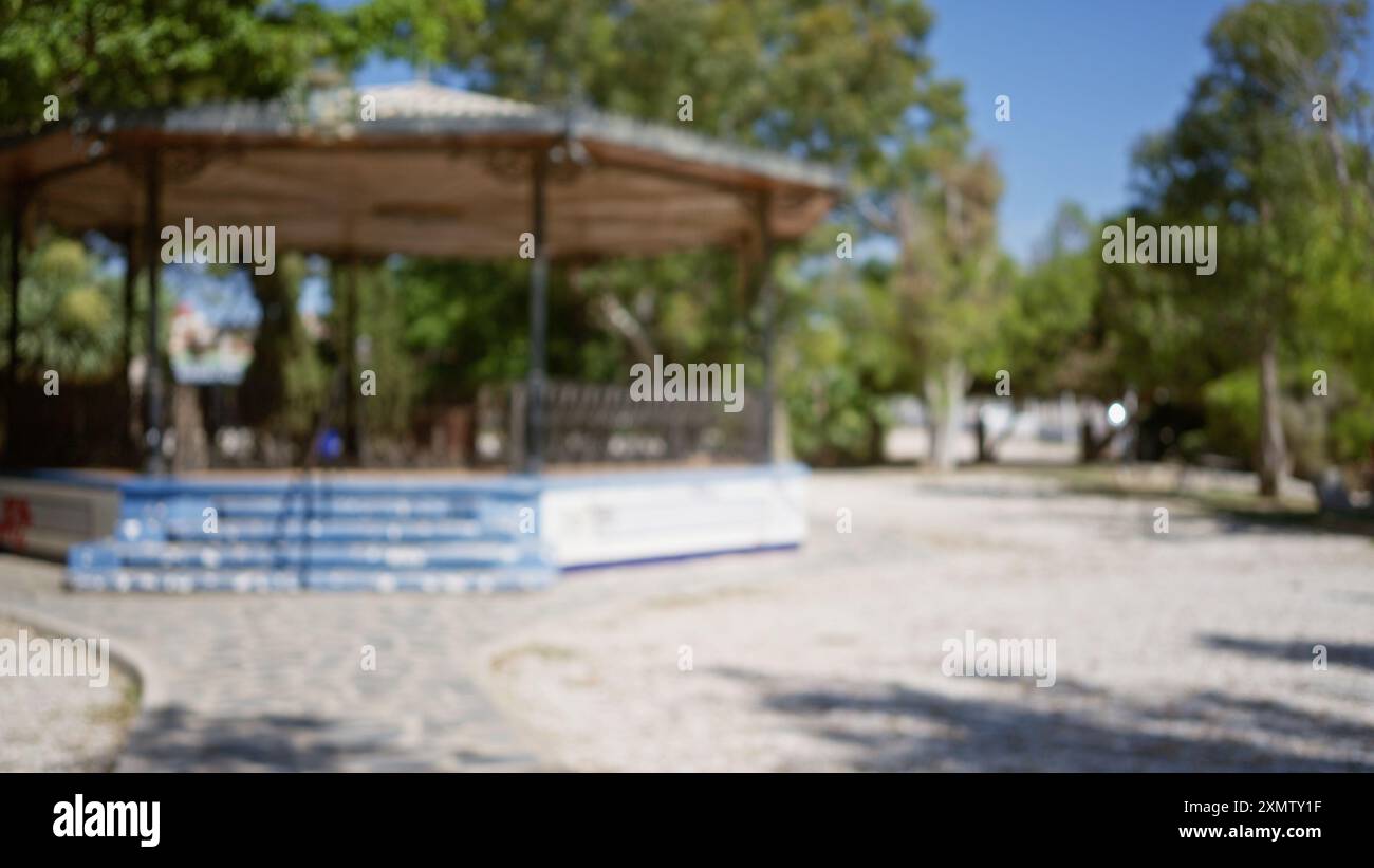 Outdoor blurry gazebo scene with soft focus background under a clear ...
