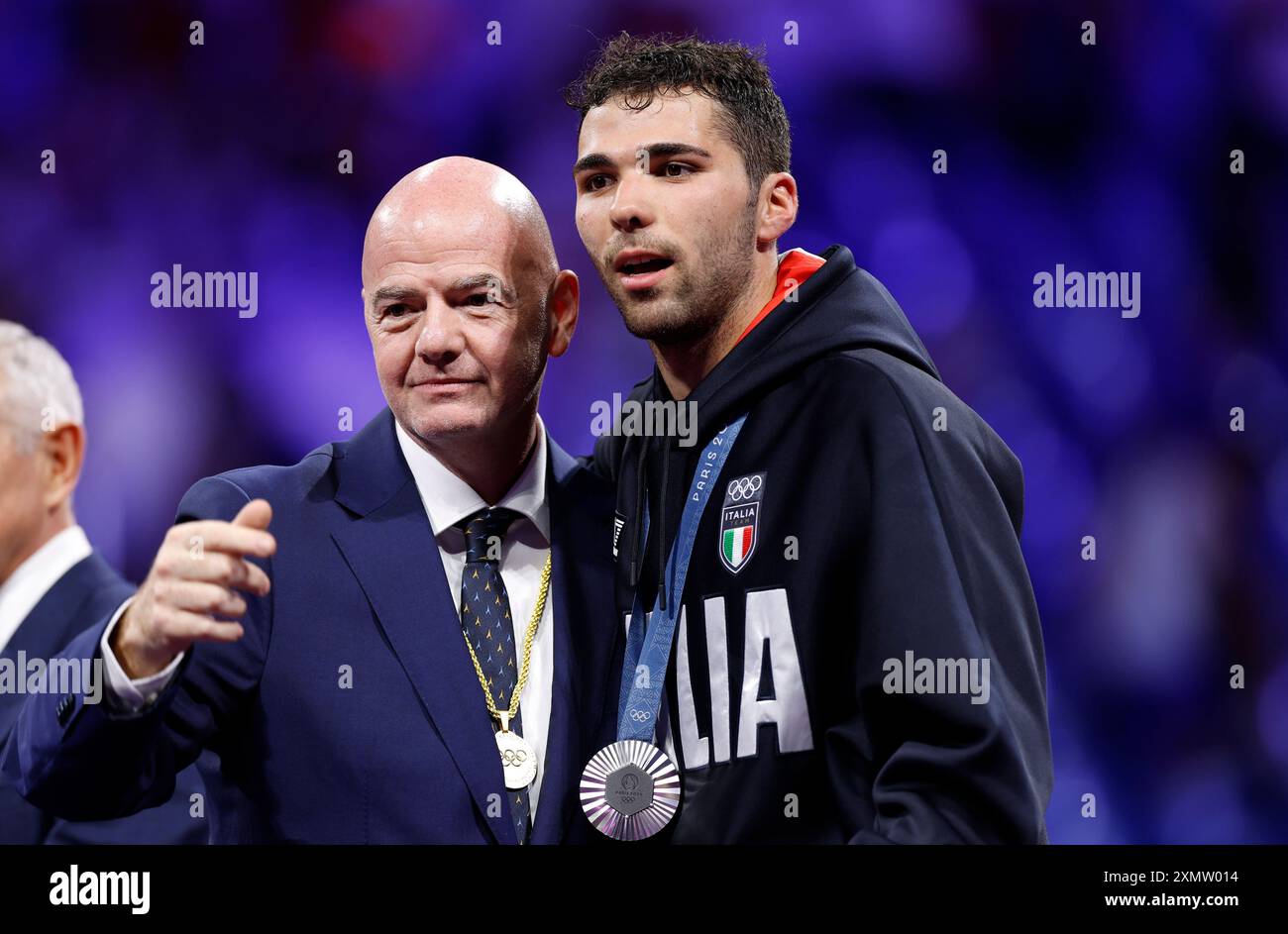 Paris, France. 29th July, 2024. Silver medalist Filippo Macchi (R) of ...