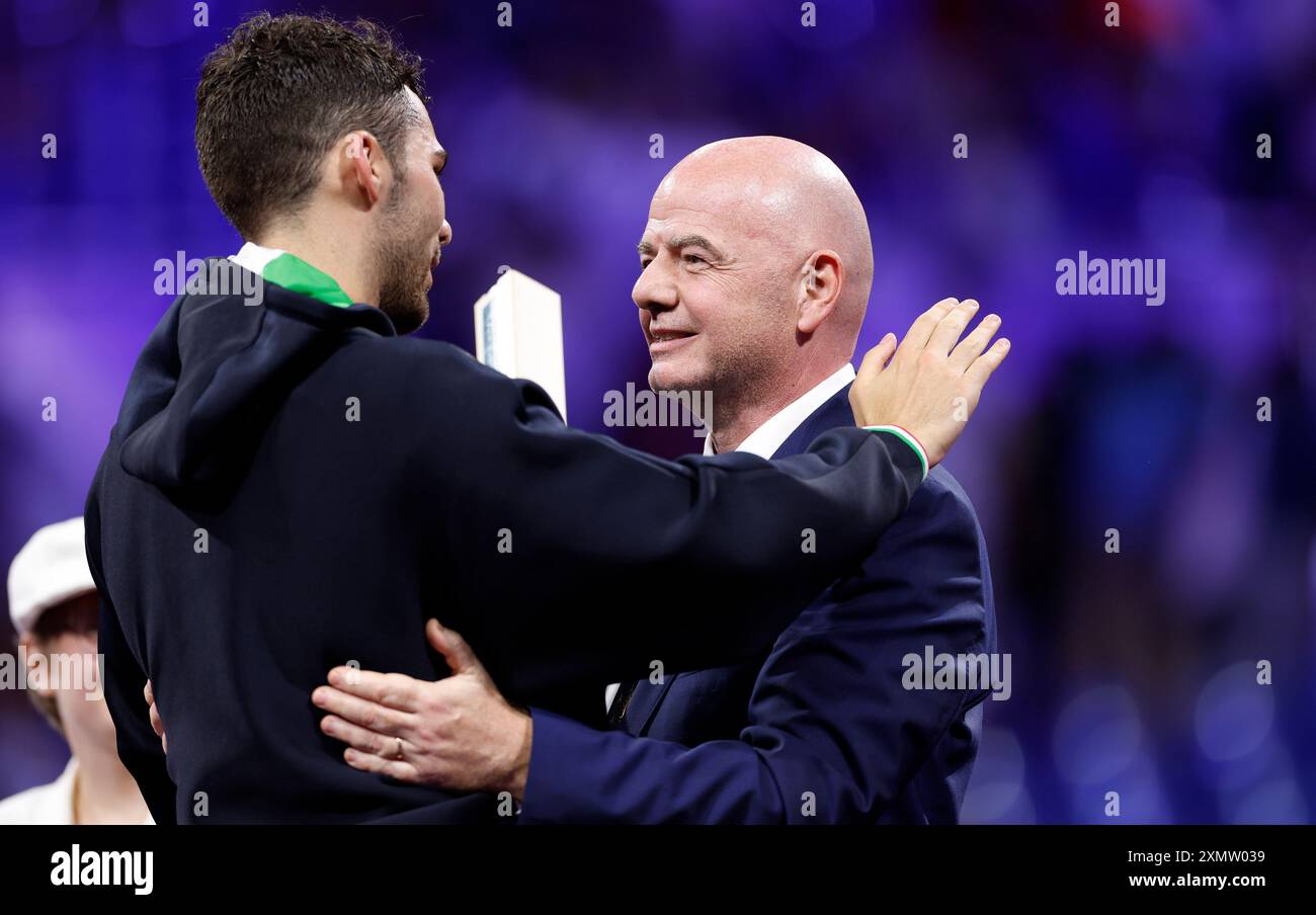 Paris, France. 29th July, 2024. Silver medalist Filippo Macchi (L) of ...
