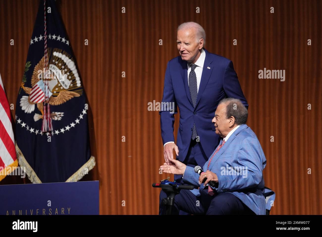 U.S. President JOE BIDEN (left) greets former ambassador ANDREW YOUNG ...