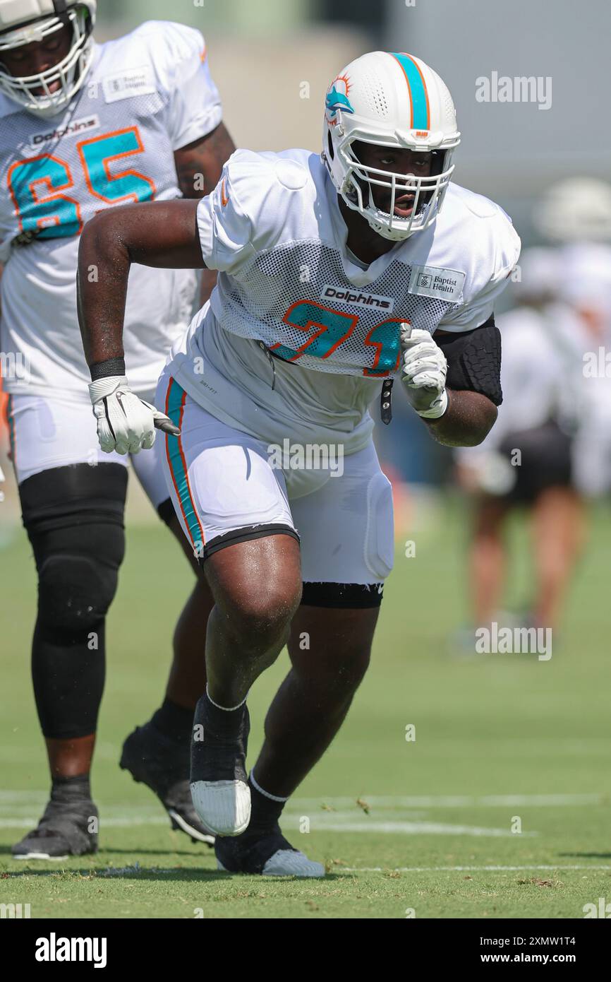 Miami Gardens, FL USA; Miami Dolphins tackle Kion Smith (71) runs ...