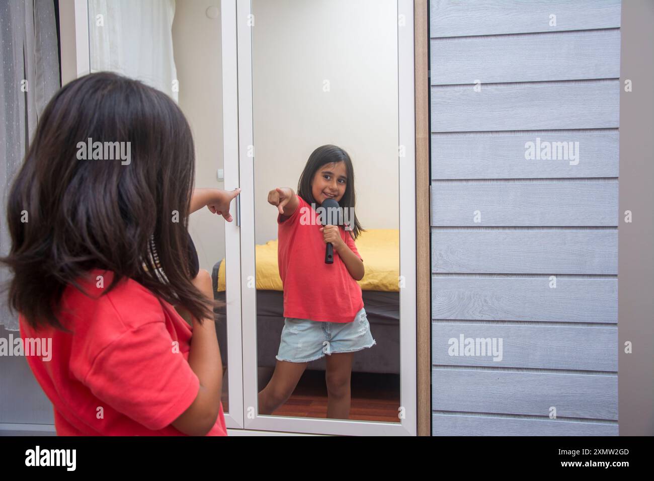 Standing microphone singing fame skill hi-res stock photography and ...