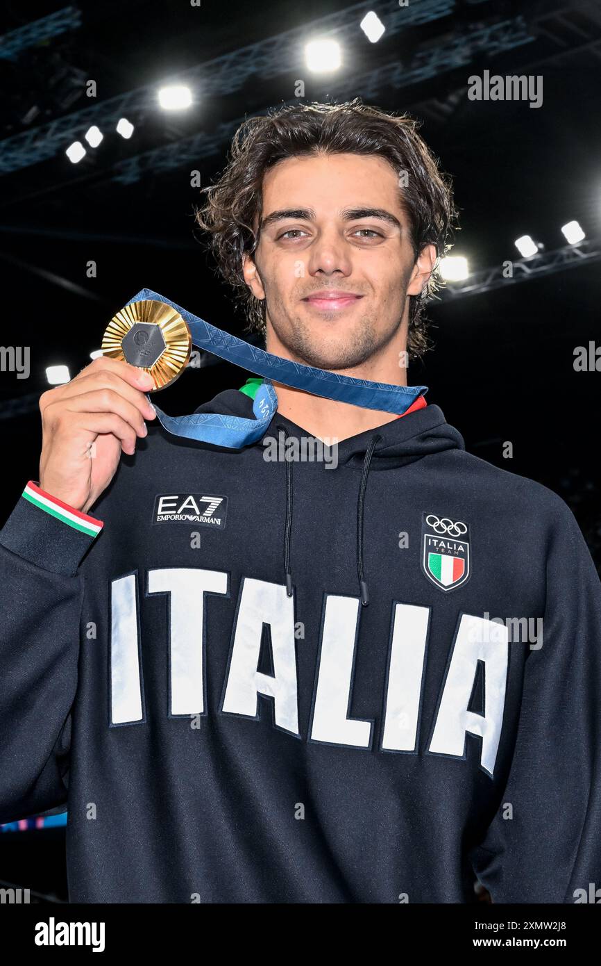Paris, France. 29th July, 2024. Thomas Ceccon of Italy shows the gold ...