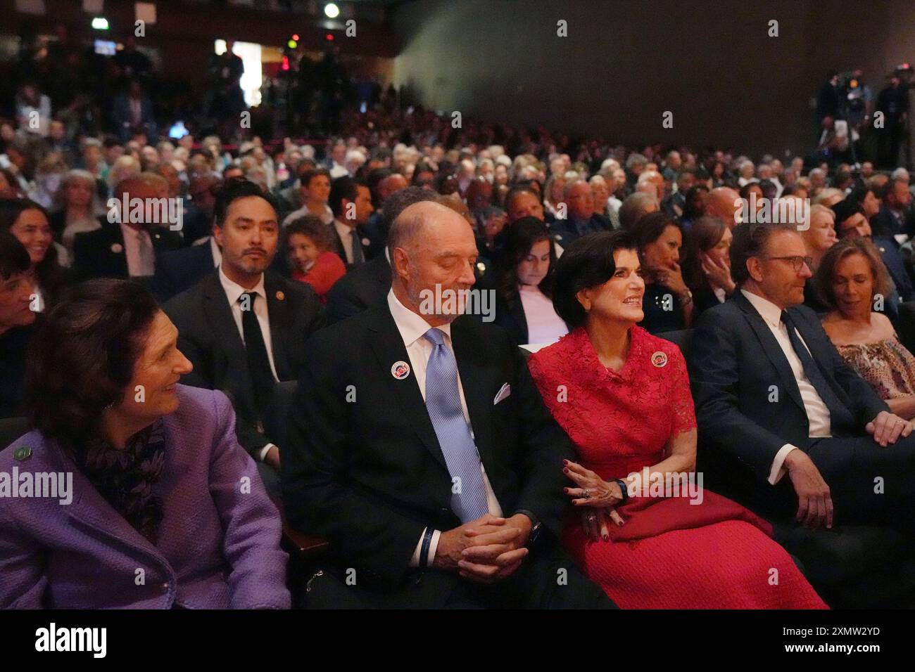 LUCI BAINES JOHNSON (in red dress) with her husband IAN TURPIN attend ...